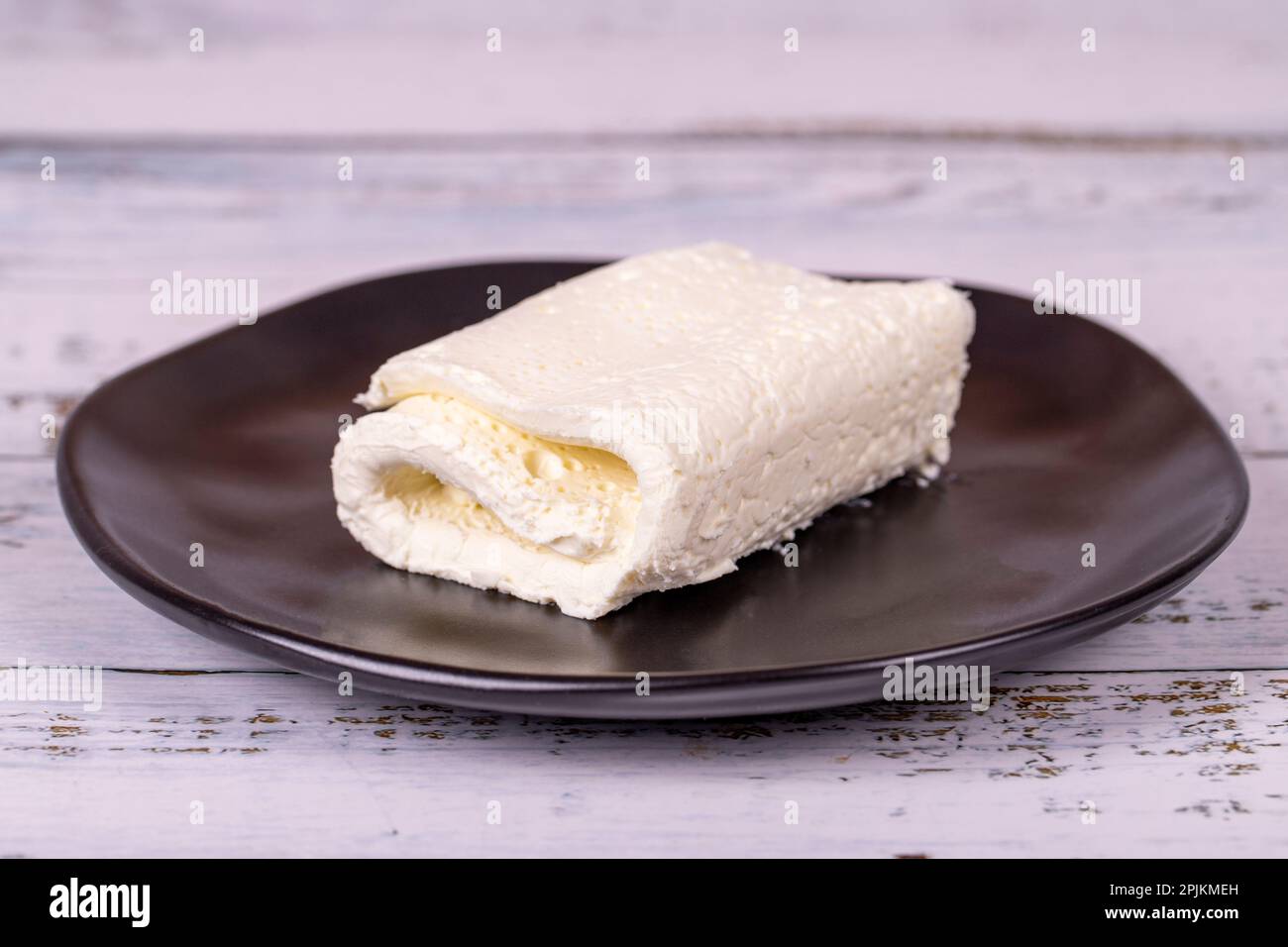 Clotted cream on wood background. Clotted cream (butter cream) for ...