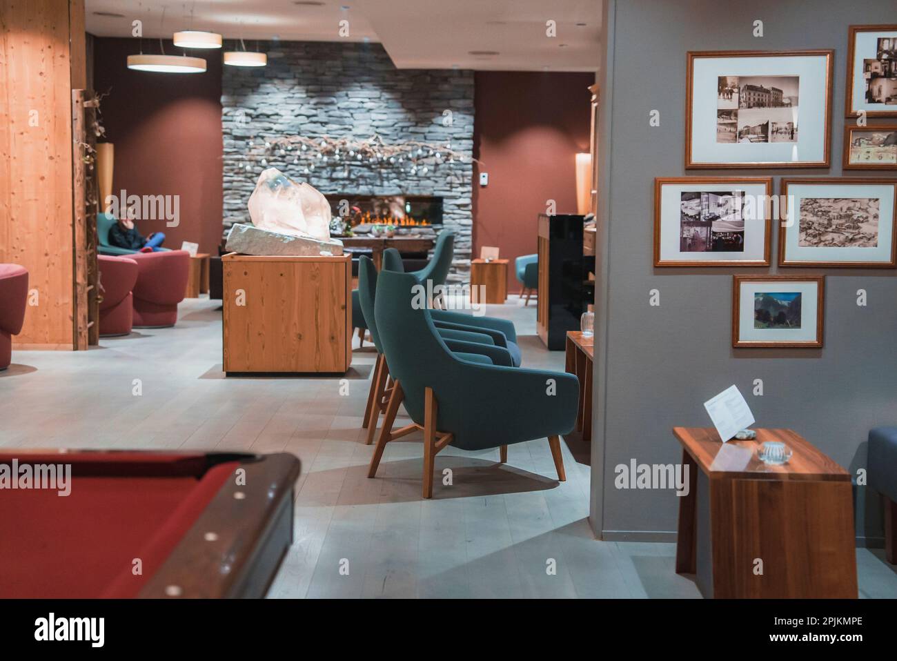 Empty chairs and picture frames in room of luxury hotel Stock Photo - Alamy