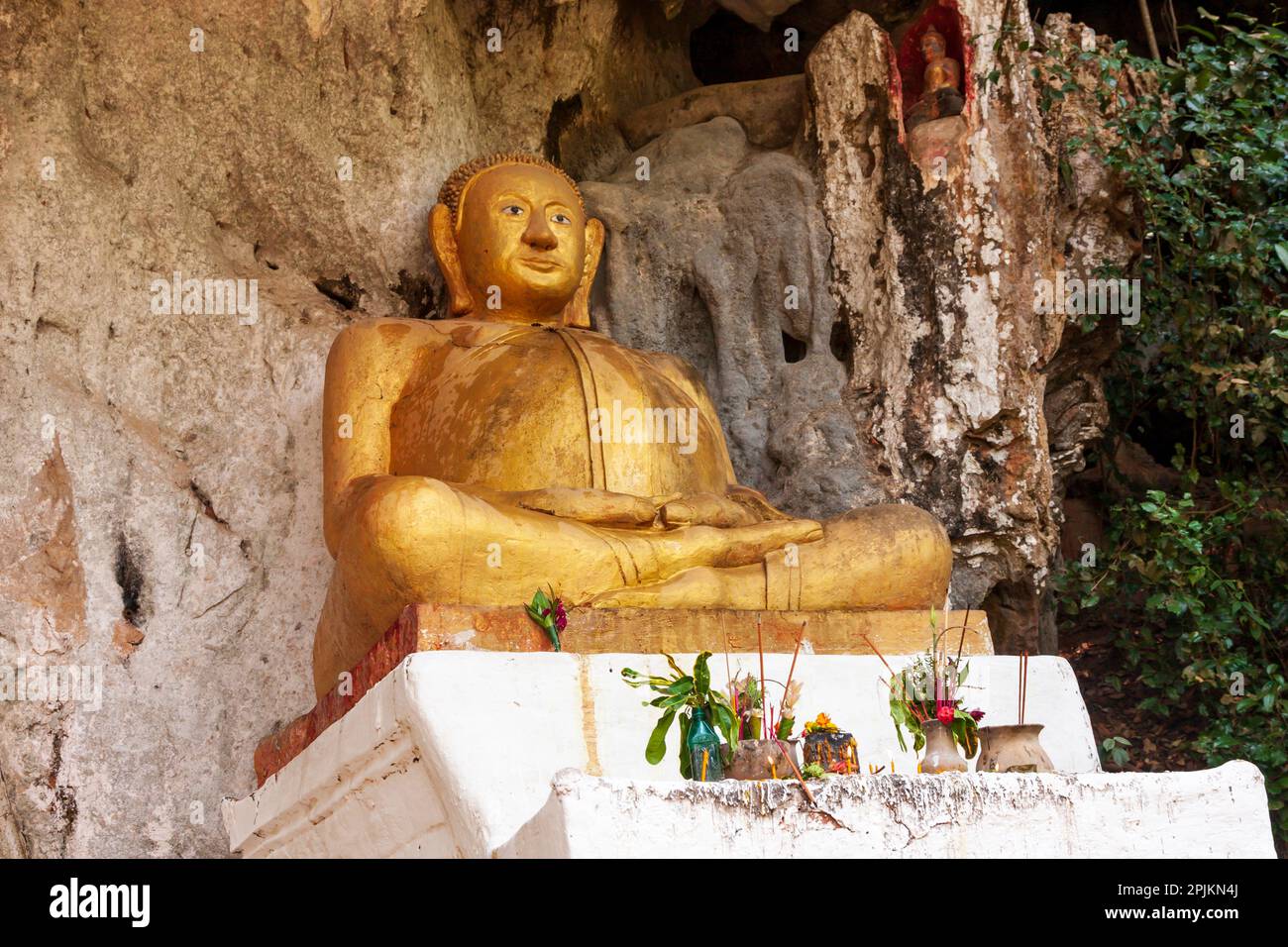 Laos, Luang Prabang. Pak Ou. Tham Ting caves. Fat Buddha statue Stock ...
