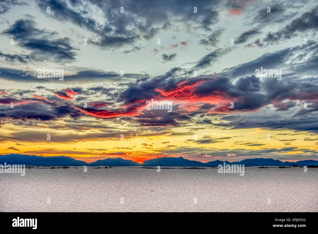 USA, New Mexico, White Sands National Park. Sunset over desert and San ...