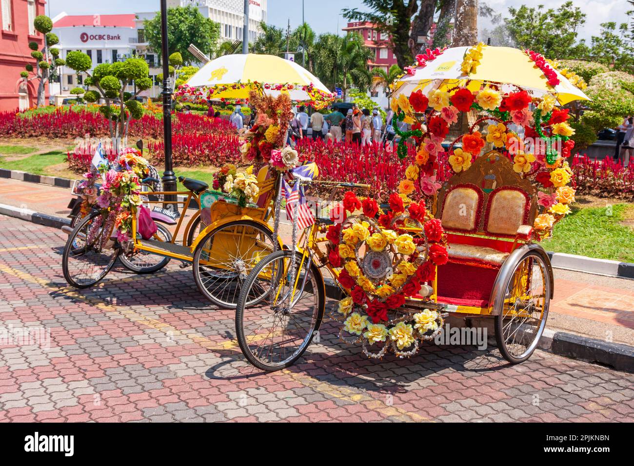 Melaka, West Malaysia. Pedicabs decorated with colorful flowers Stock ...