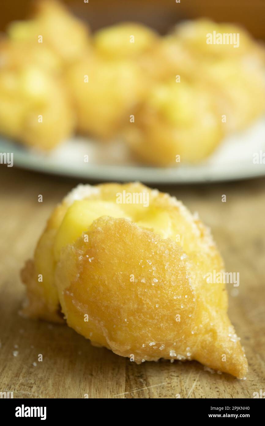 fried cream puffs filled with Chantilly cream Stock Photo - Alamy