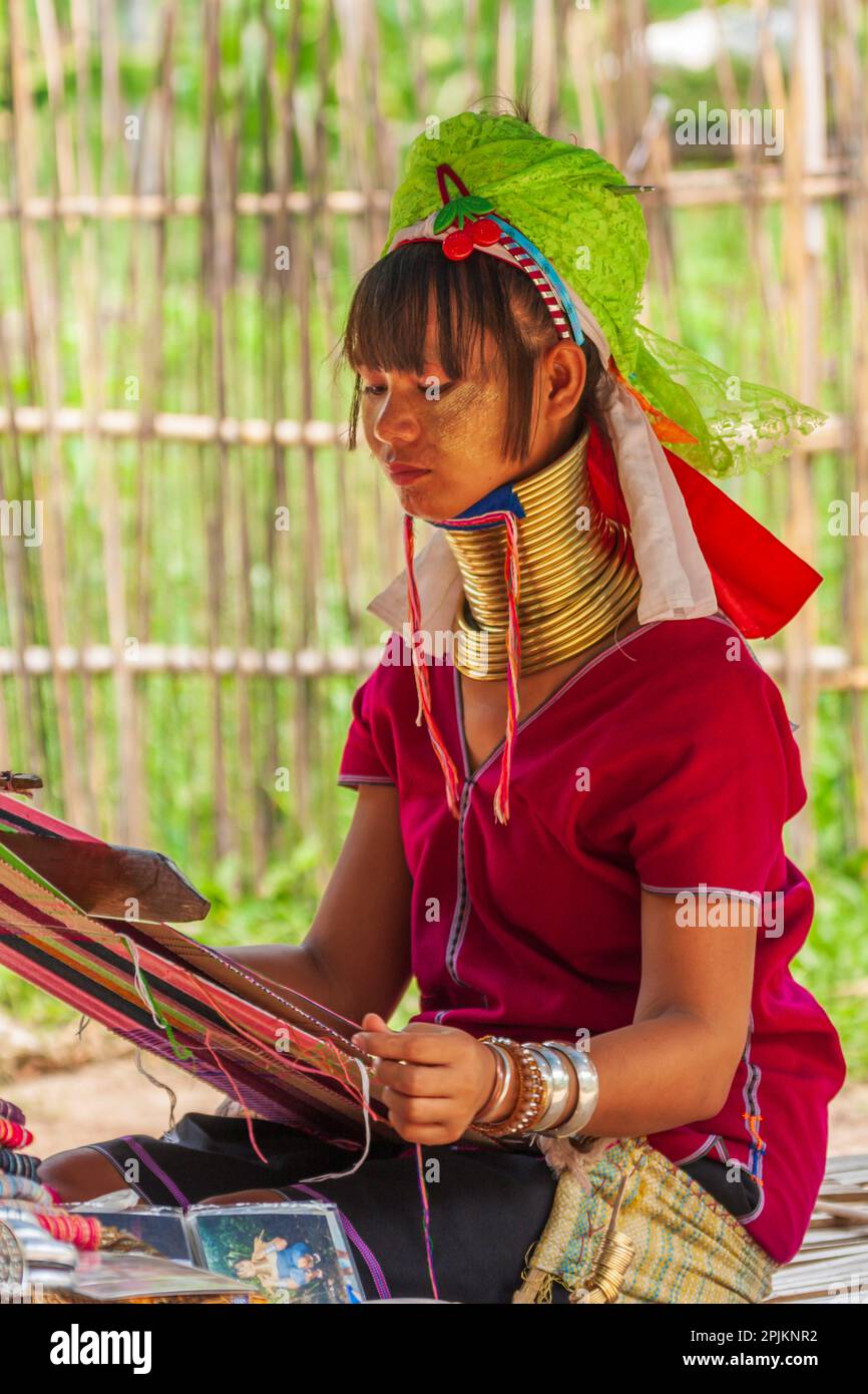 Chiang Mai, Thailand. A woman from the Padaung tribe wearing ...