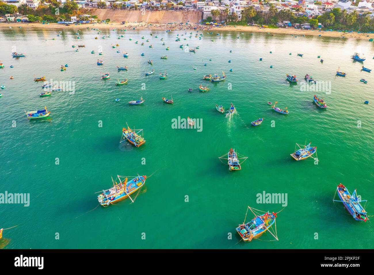 Aerial view of Mui Ne fishing village in the morning with hundreds of ...