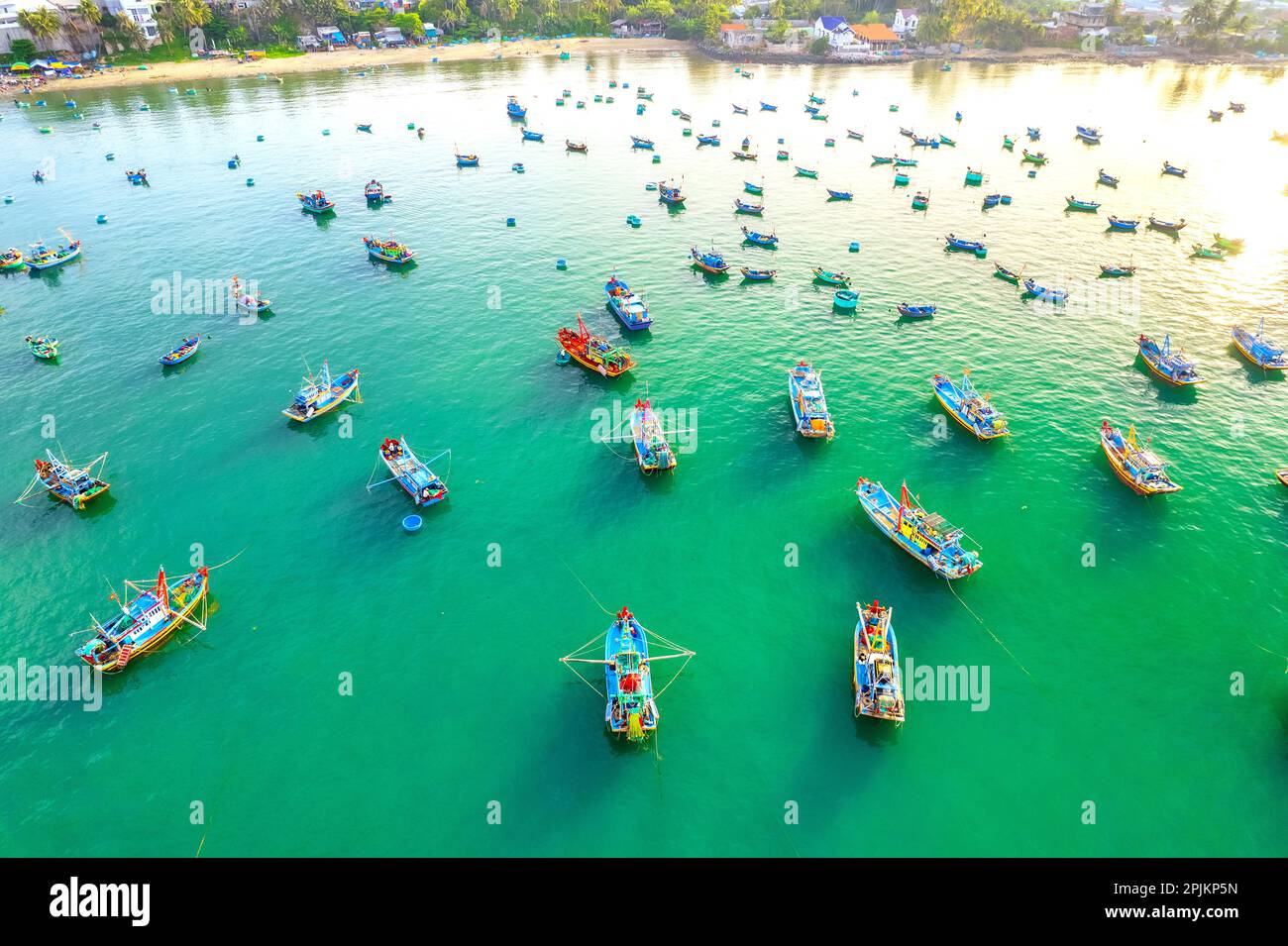 Aerial view of Mui Ne fishing village in the morning with hundreds of ...