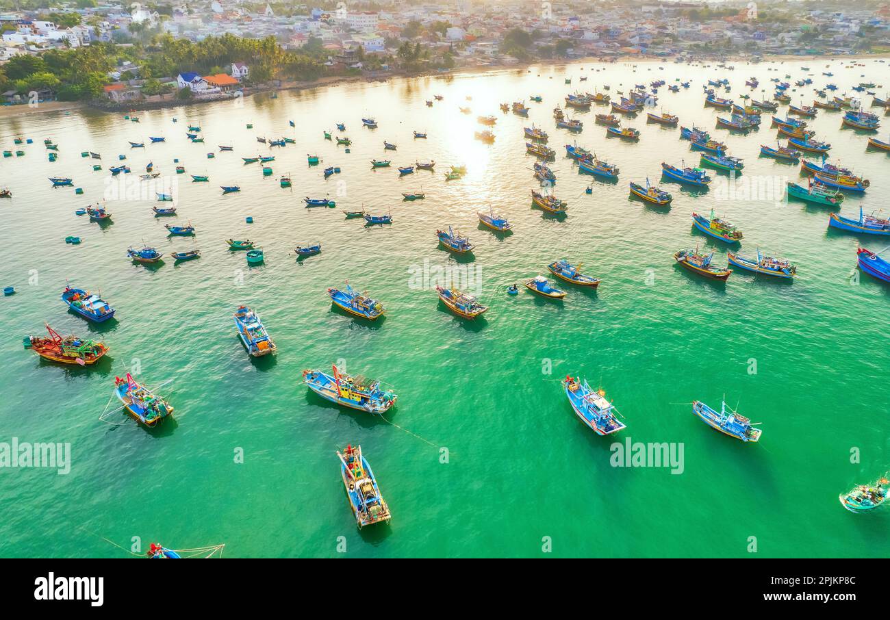 Aerial view of Mui Ne fishing village in the morning with hundreds of ...