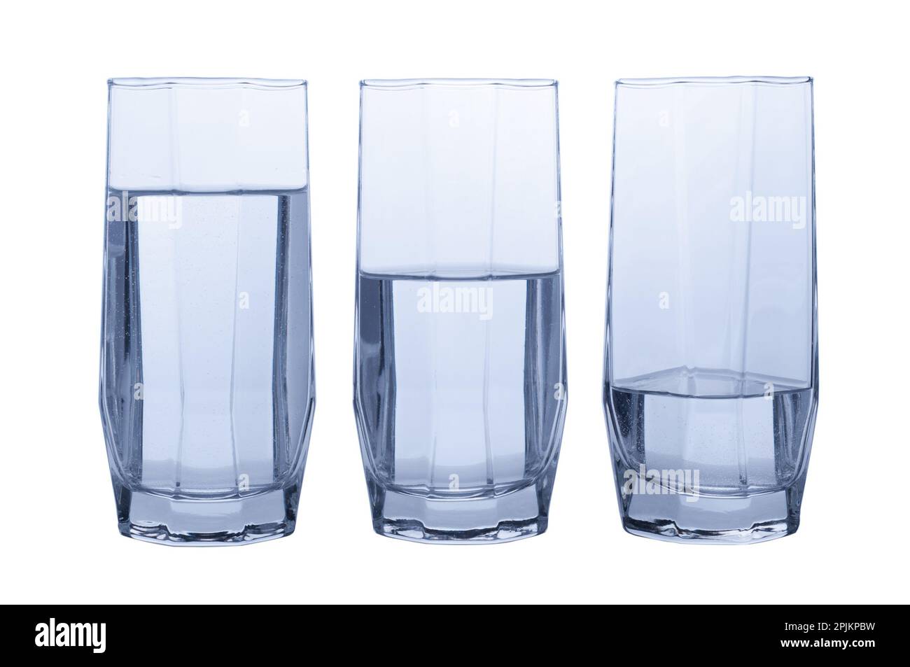 Three glasses of clear water Full, half and quarter. Isolated ...
