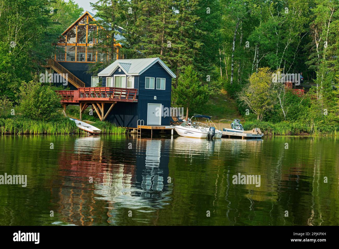 Canada, Manitoba, Whiteshell Provincial Park. Cottage reflections on ...
