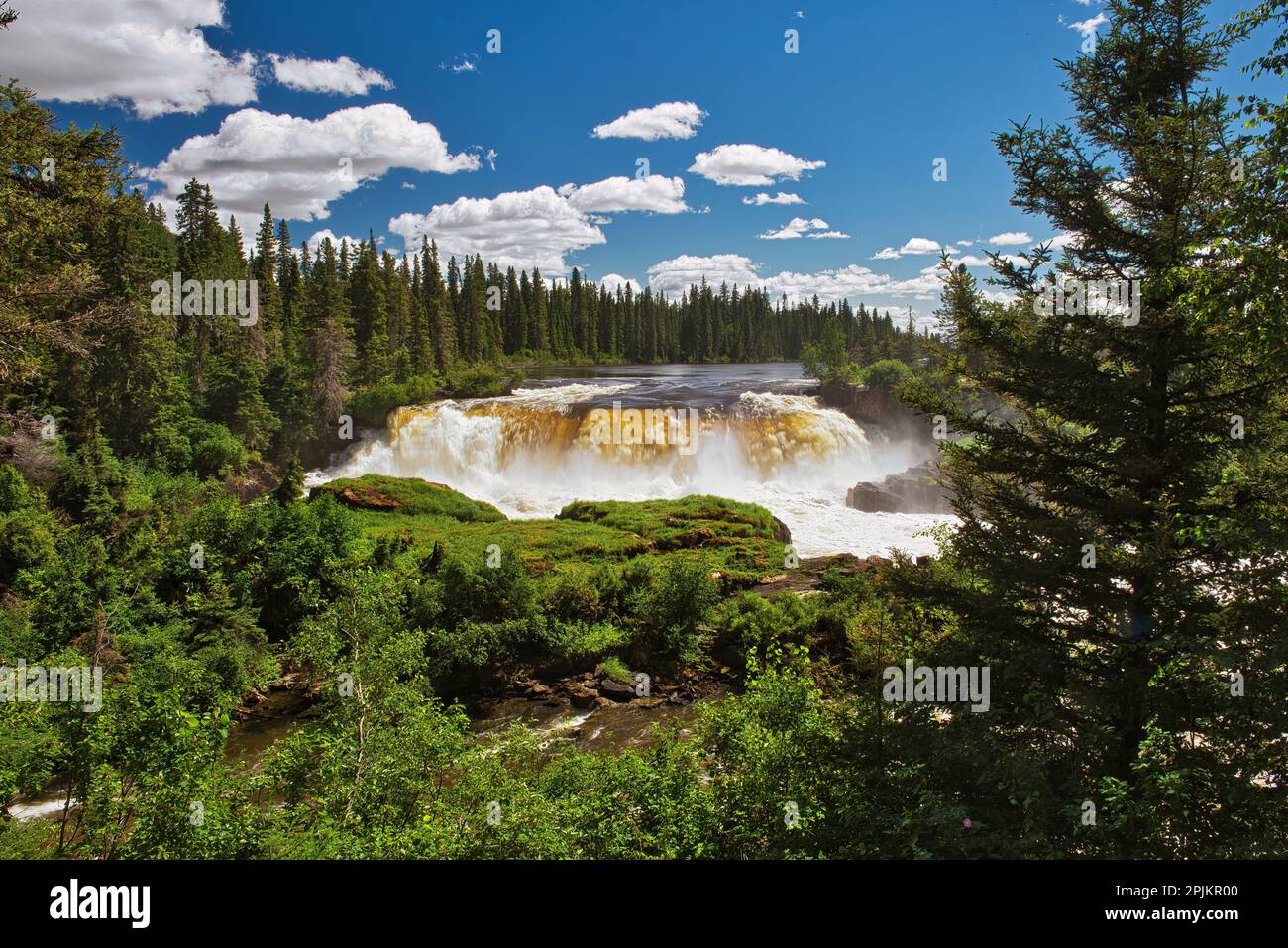 Canada, Manitoba, Pisew Falls Provincial Park. Pisew Falls and forest ...