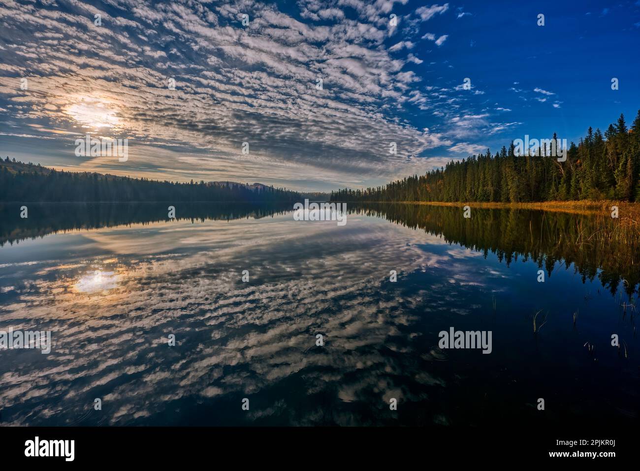 Canada, Manitoba, Duck Mountain Provincial Park. Cloud reflections in ...