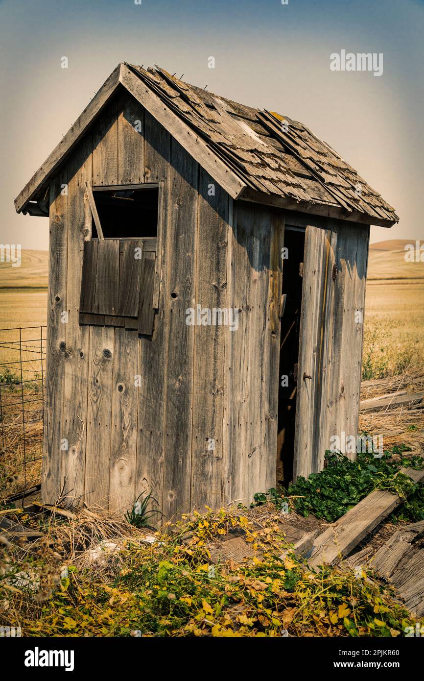 USA, Washington State, Whitman County, Palouse. Bauer Road. Outhouse ...