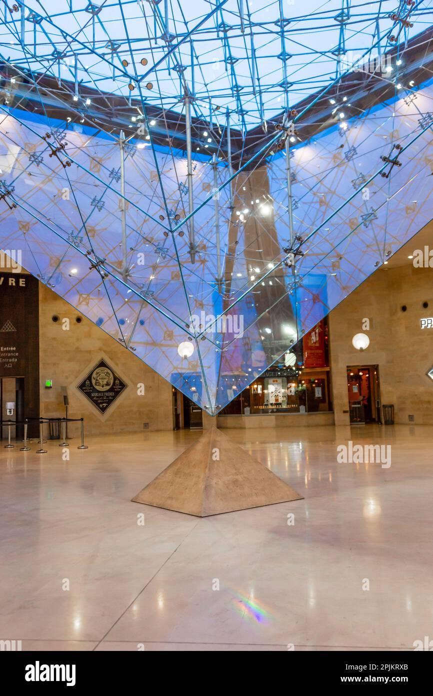 Paris. Louvre. Pyramid. Louvre. Interior glass Triangle, pyramid ...