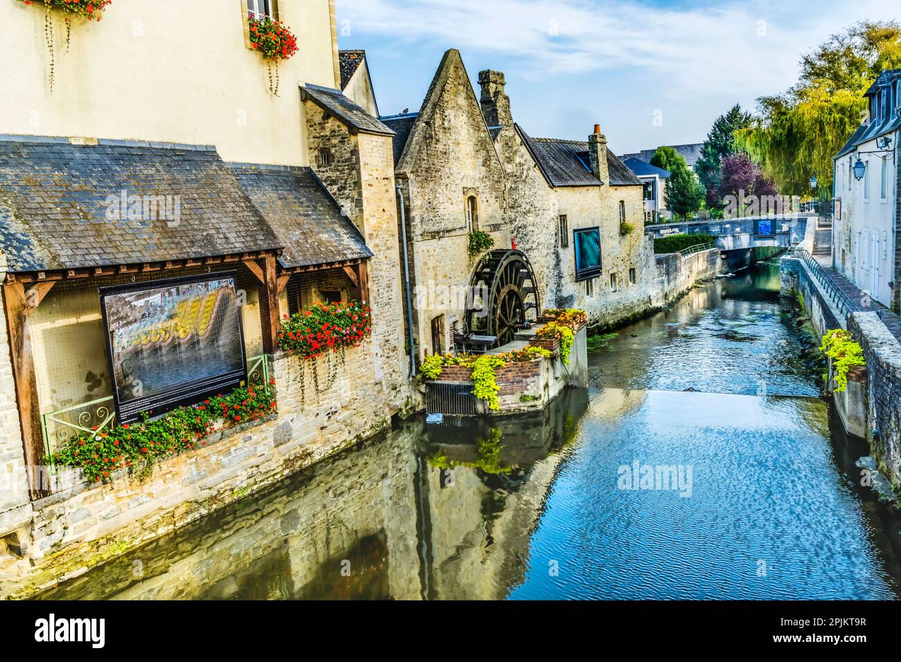 Colorful old buildings, Aure River reflection, Bayeux, Normandy, France ...