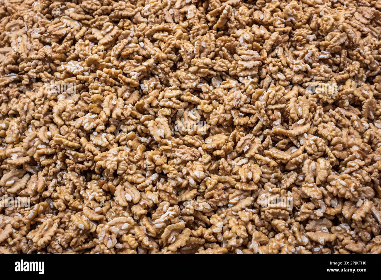 Walnut Kernels Background. Close-up Texture of Unshelled Walnut Pile ...