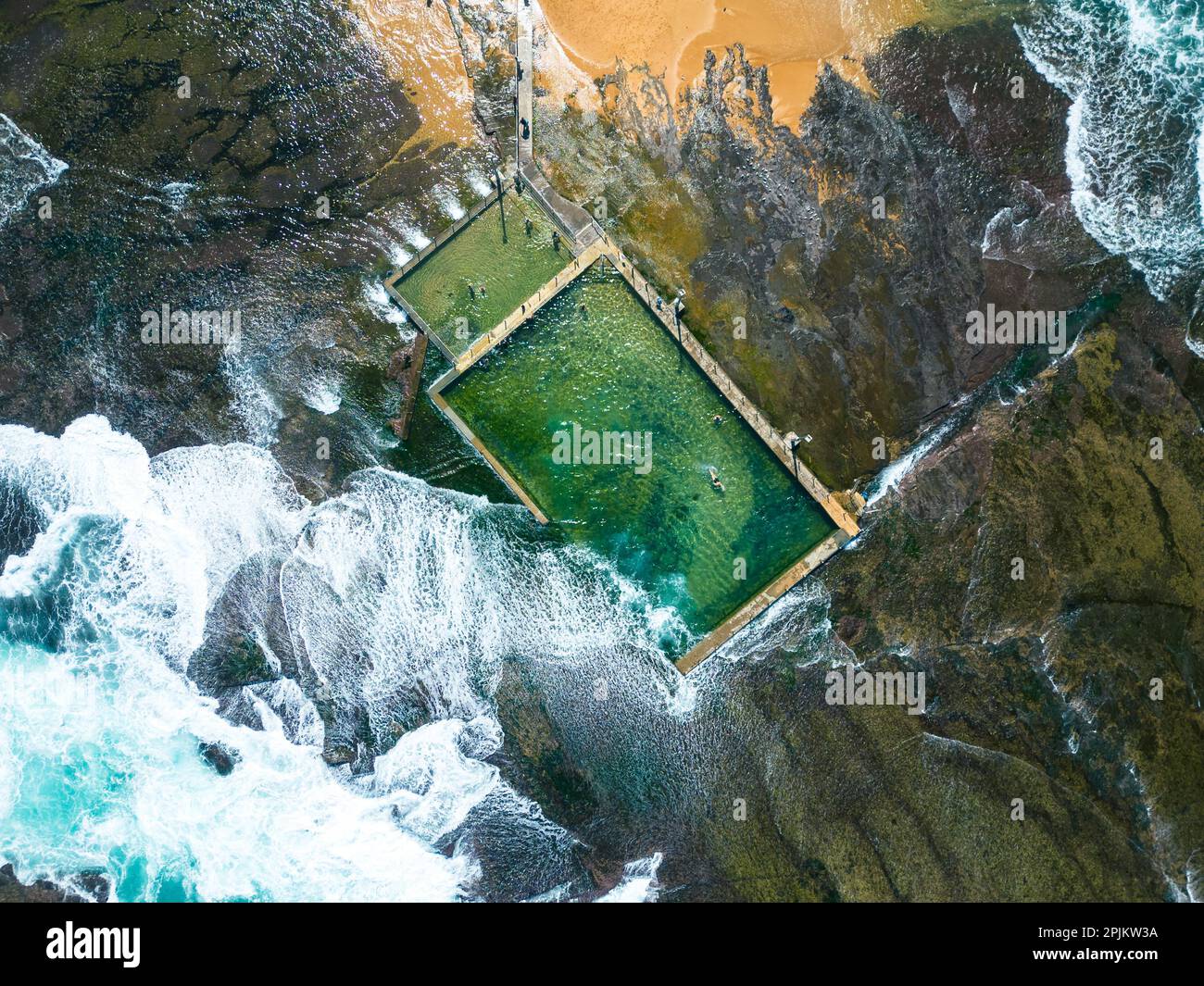 The tranquil Mona Vale Pool situated in a picturesque coastal setting ...