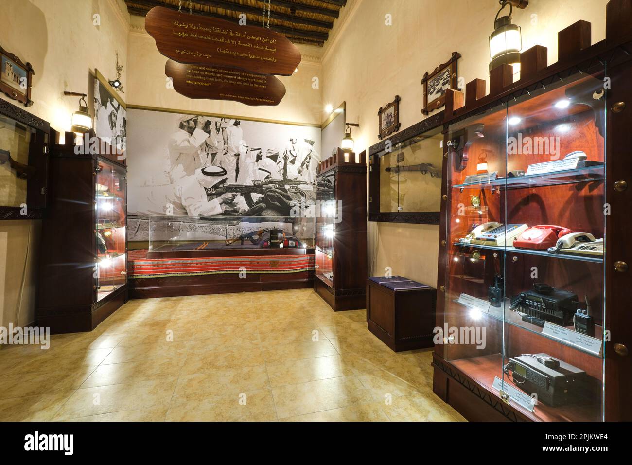 A display featuring old telephones, communications equipment and the ...