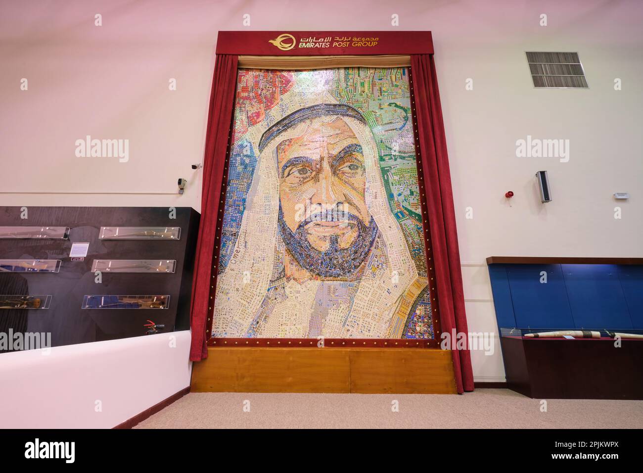 A huge portrait of the Sheikh, made from mail, postage stamps. At the ...