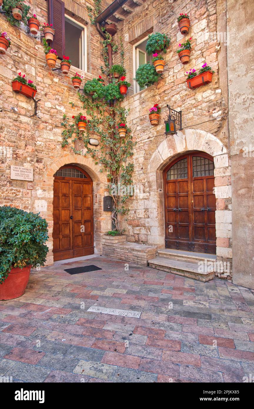 Italy, Umbria, Assisi. Entrance to an old convent/monastery turned into ...