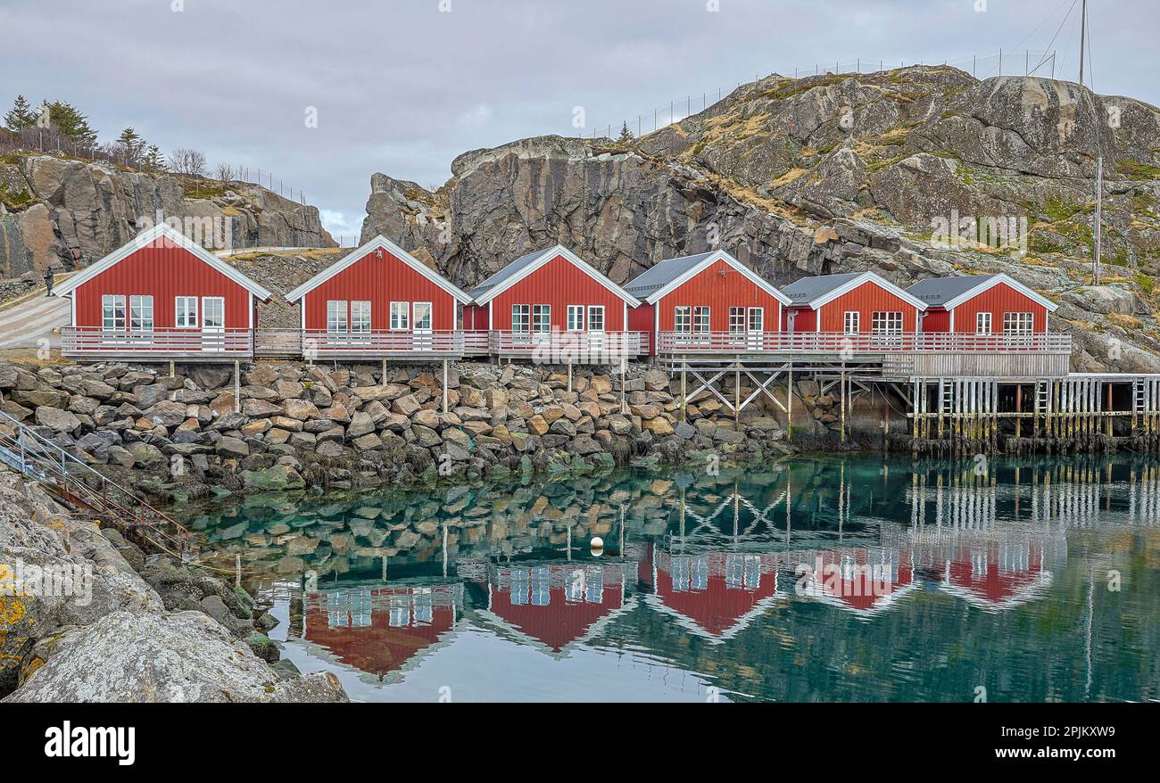 Norway, Lofoten Islands. Rorbuer in Mortsund near Mount Himmeltindan ...