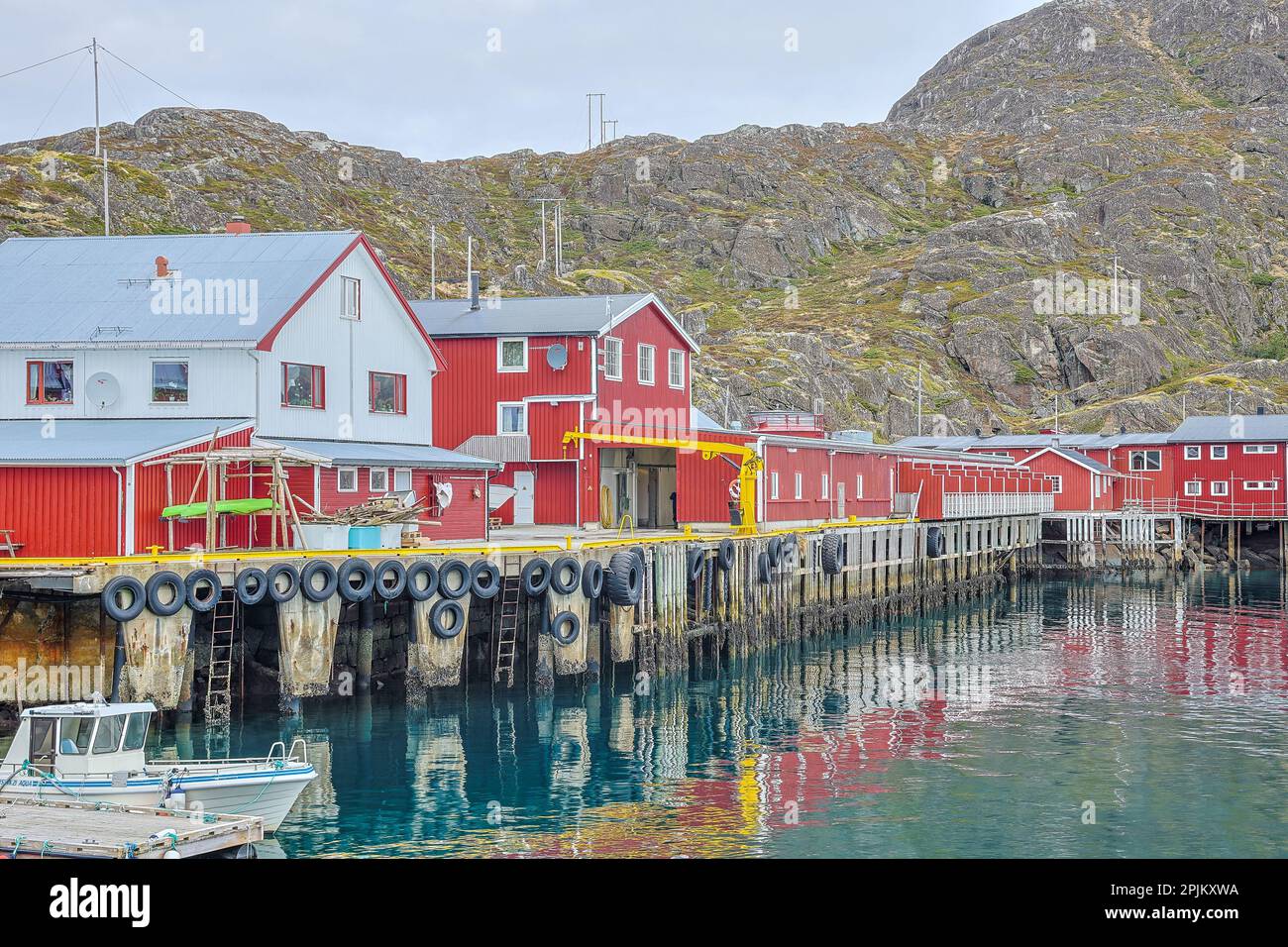 Norway, Lofoten Islands. Rorbuer in Mortsund near Mount Himmeltindan ...