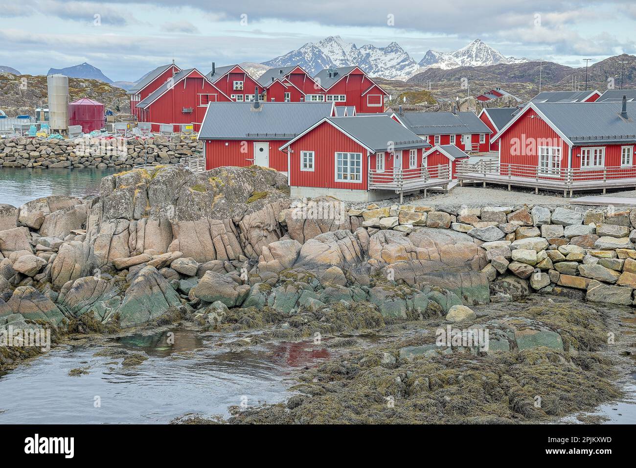Norway, Lofoten Islands. Rorbuer in Mortsund near Mount Himmeltindan ...