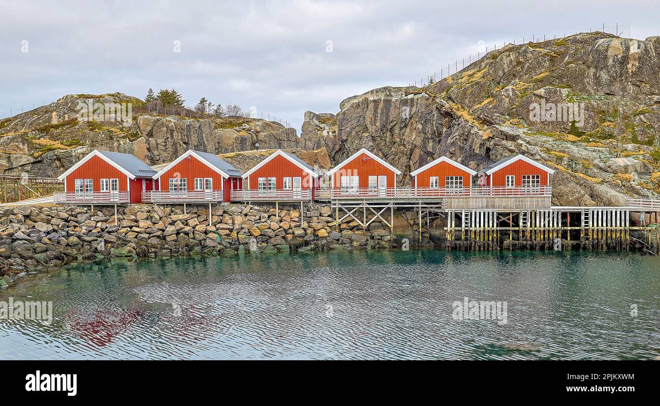 Norway, Lofoten Islands. Rorbuer in Mortsund near Mount Himmeltindan ...