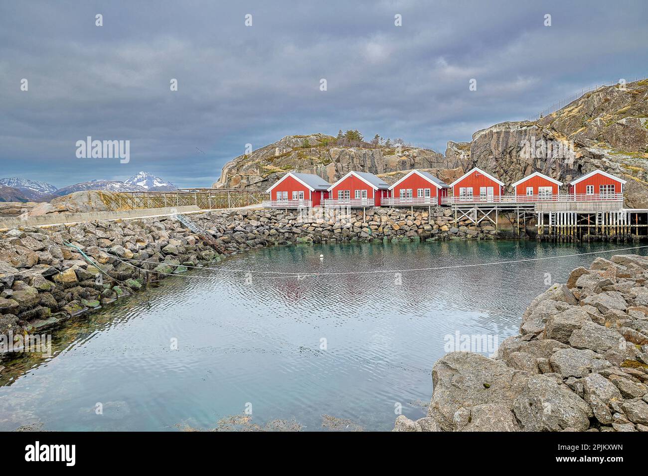 Norway, Lofoten Islands. Rorbuer in Mortsund near Mount Himmeltindan ...
