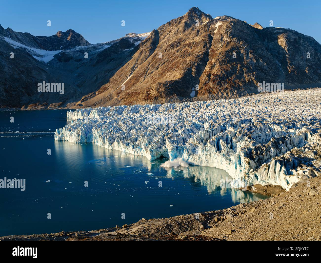 Ice calving. Knud Rasmussen Glacier (also called Apuseeq Glacier) in ...