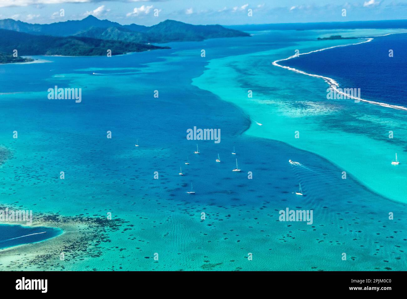 French Polynesia, Raiatea. Aerial view of island and ocean Stock Photo ...