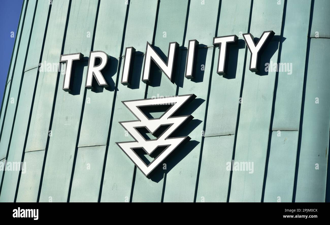 Exterior sign on Trinity Church of England High School, a multi-faith ...