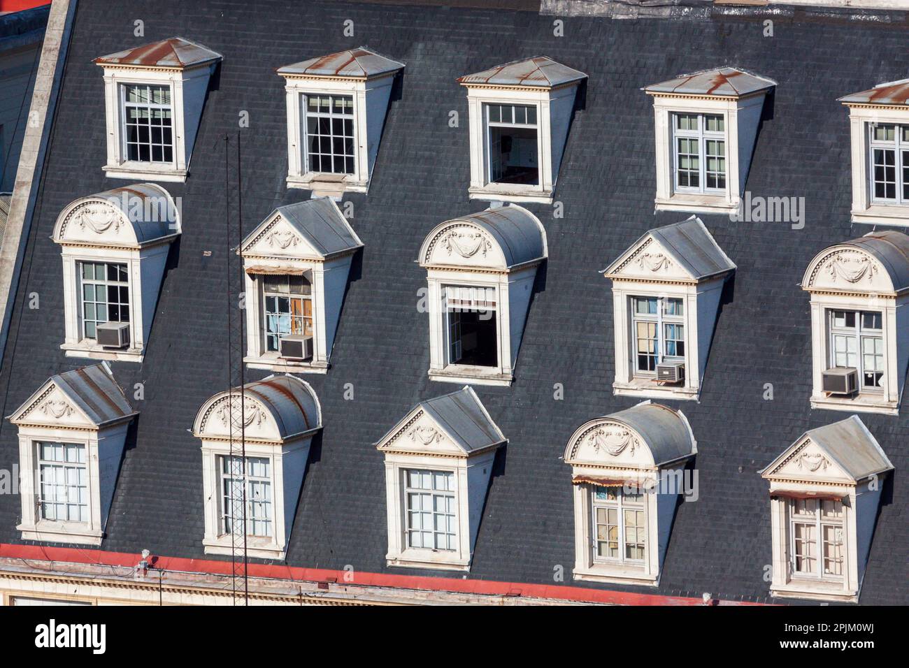 Argentina, Buenos Aires. Many dormer windows in a sloping roof Stock ...