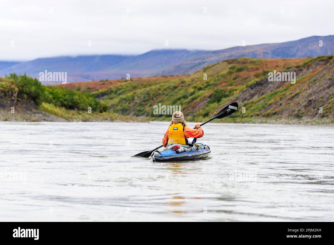 USA, Alaska, Noatak National Preserve. Kayaker on the Noatak River. (MR ...