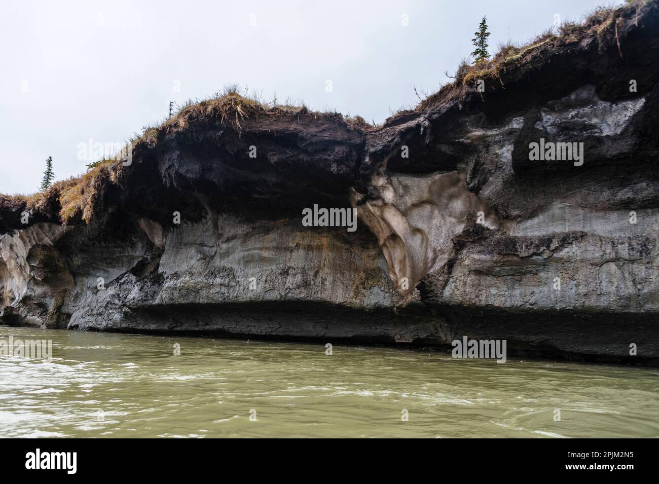 USA, Alaska, Noatak, Noatak River. The river carving a path through ...