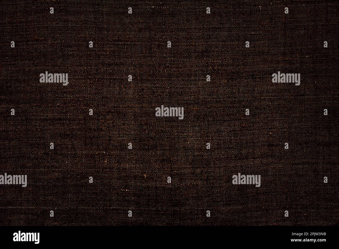 Natural linen fabric, background or texture, toned in brown color, top ...