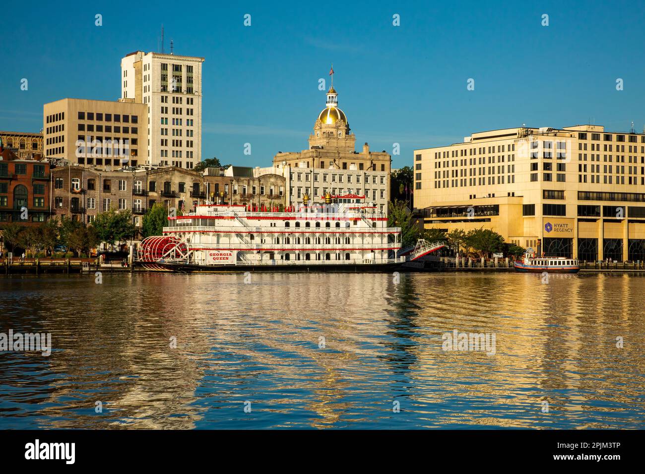 USA, Georgia, Savannah. River Street with the Georgia Queen docked ...