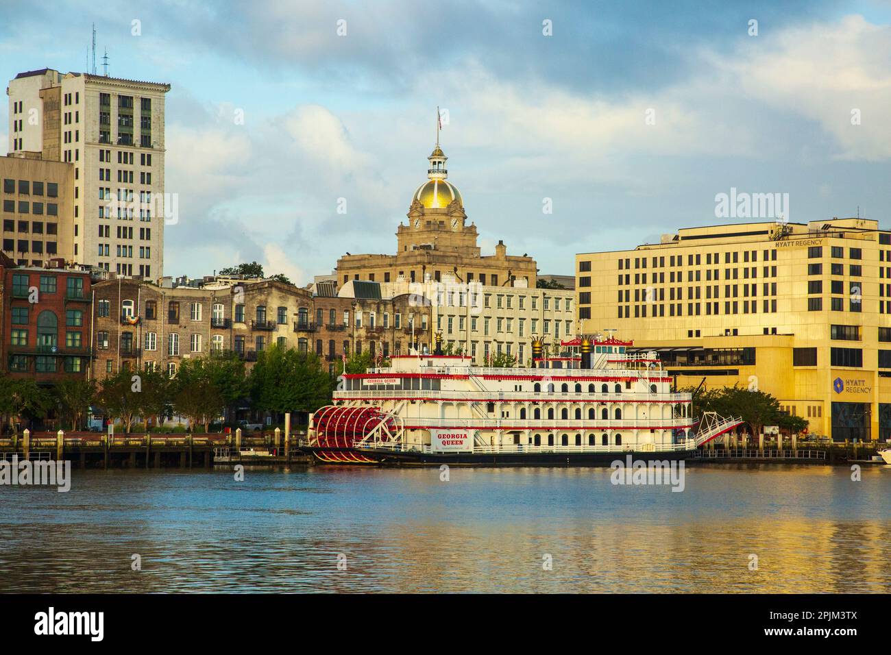 USA, Georgia, Savannah. River Street with the Georgia Queen docked ...