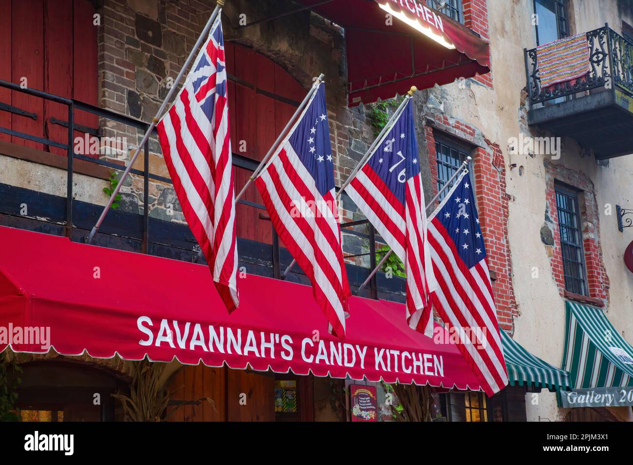 USA, Georgia, Savannah. Flags displayed along River street. (Editorial ...