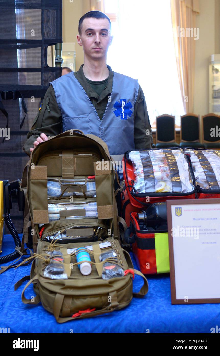 Backpack with soldier s first aid kit: bandages, wound-healing drugs ...
