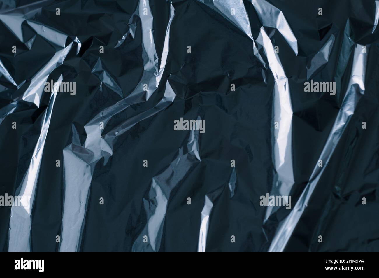 Metallic foil texture. Metallic background. Metal glittering, crushed ...