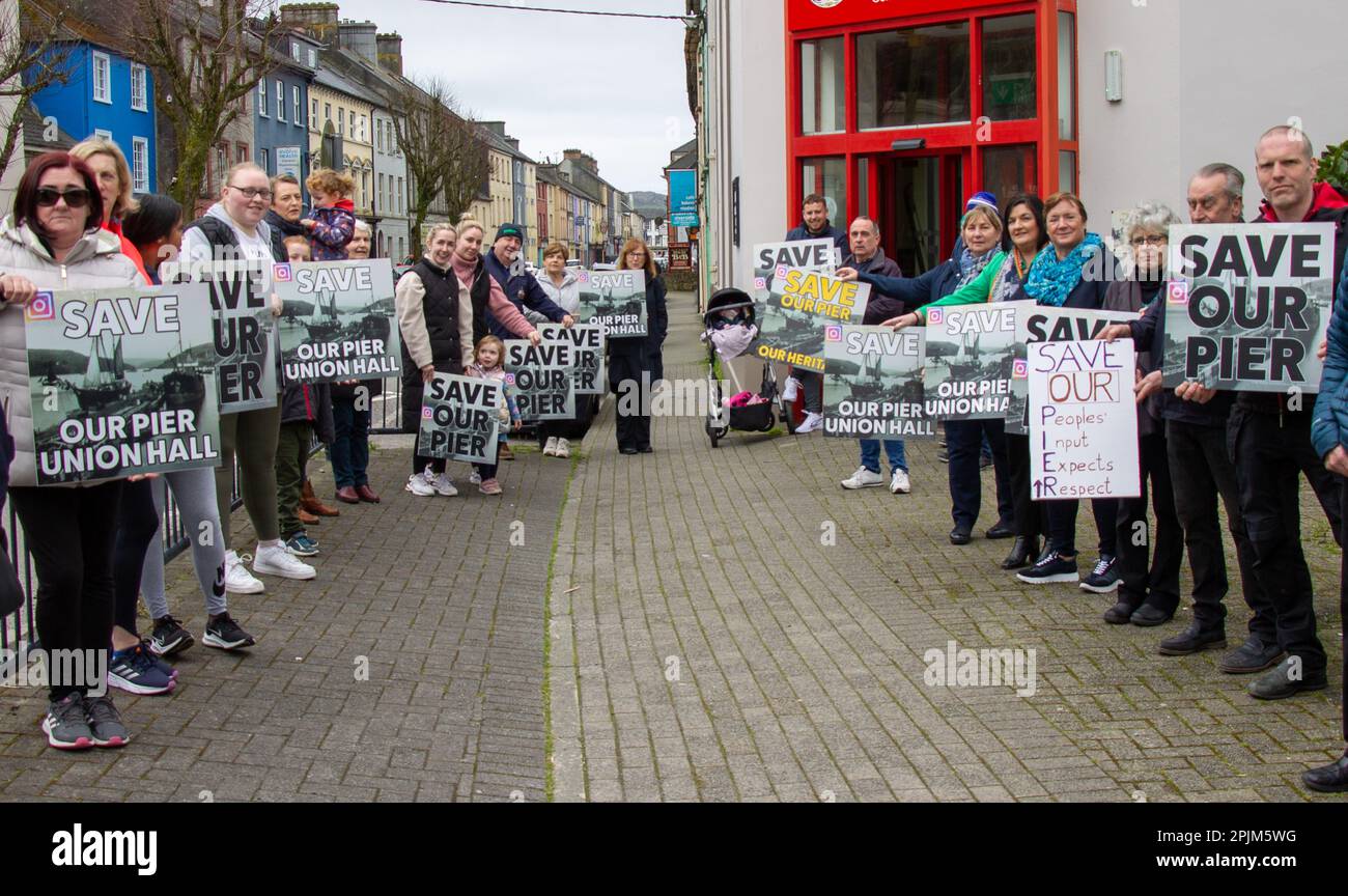 People demonstrating or protesting in Ireland with placards to save ...