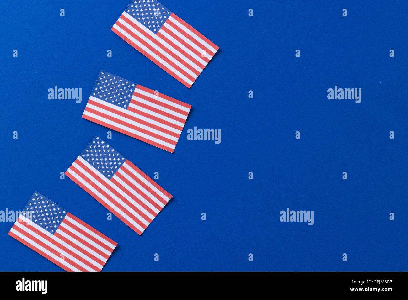 High angle view of four flags of united states of america with copy ...