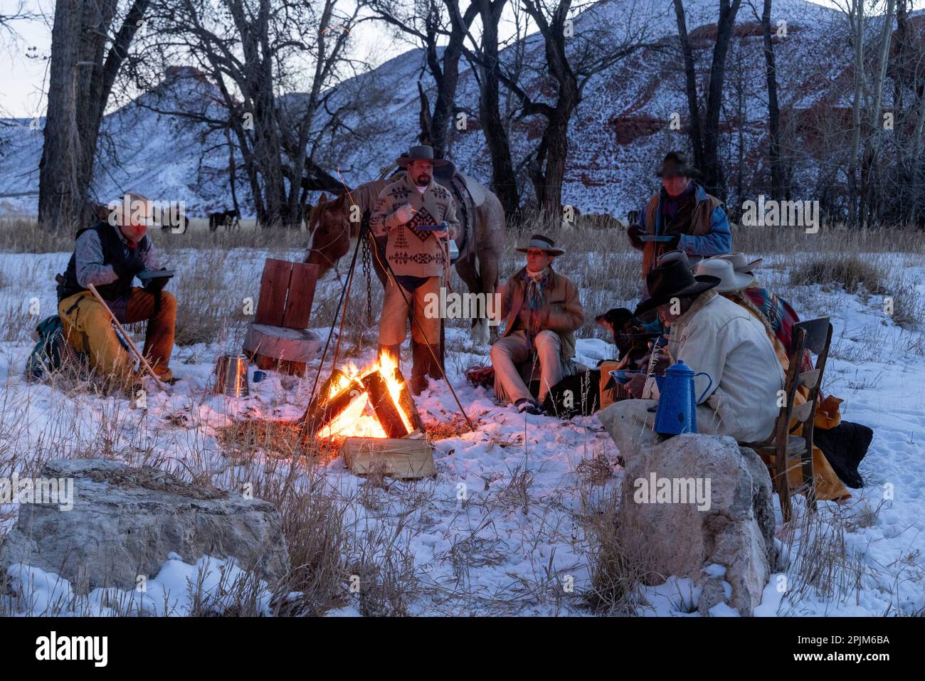 USA, Wyoming. Hideout Horse Ranch, wranglers and horse around the campfire. (MR,PR Stock Photo ...