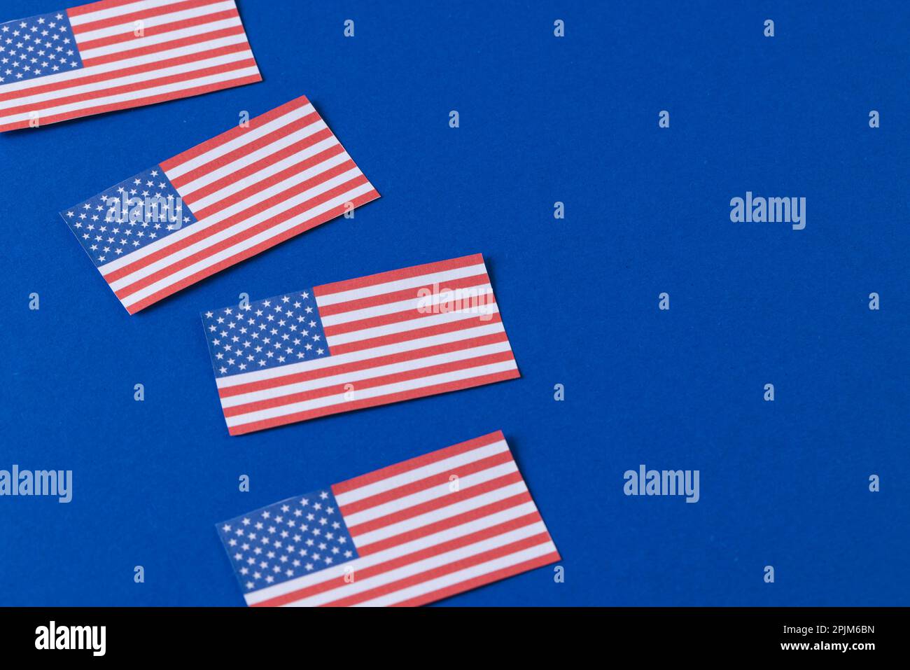 High angle view of four flags of united states of america with copy ...