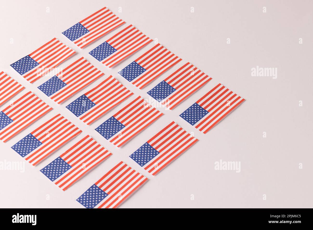 Rows of flags of united states of america with copy space on white ...