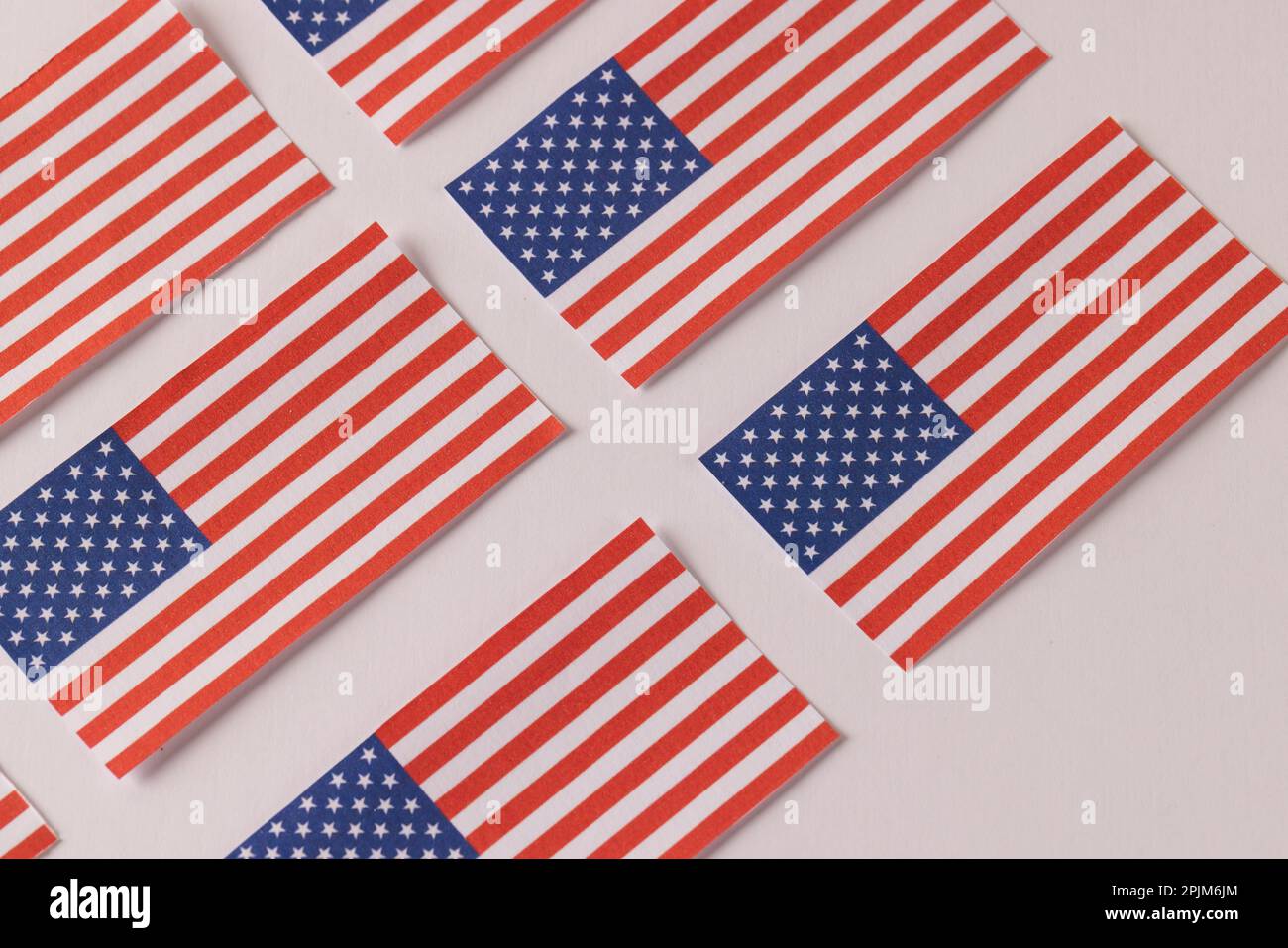 Close up of rows of flags of united states of america on white ...