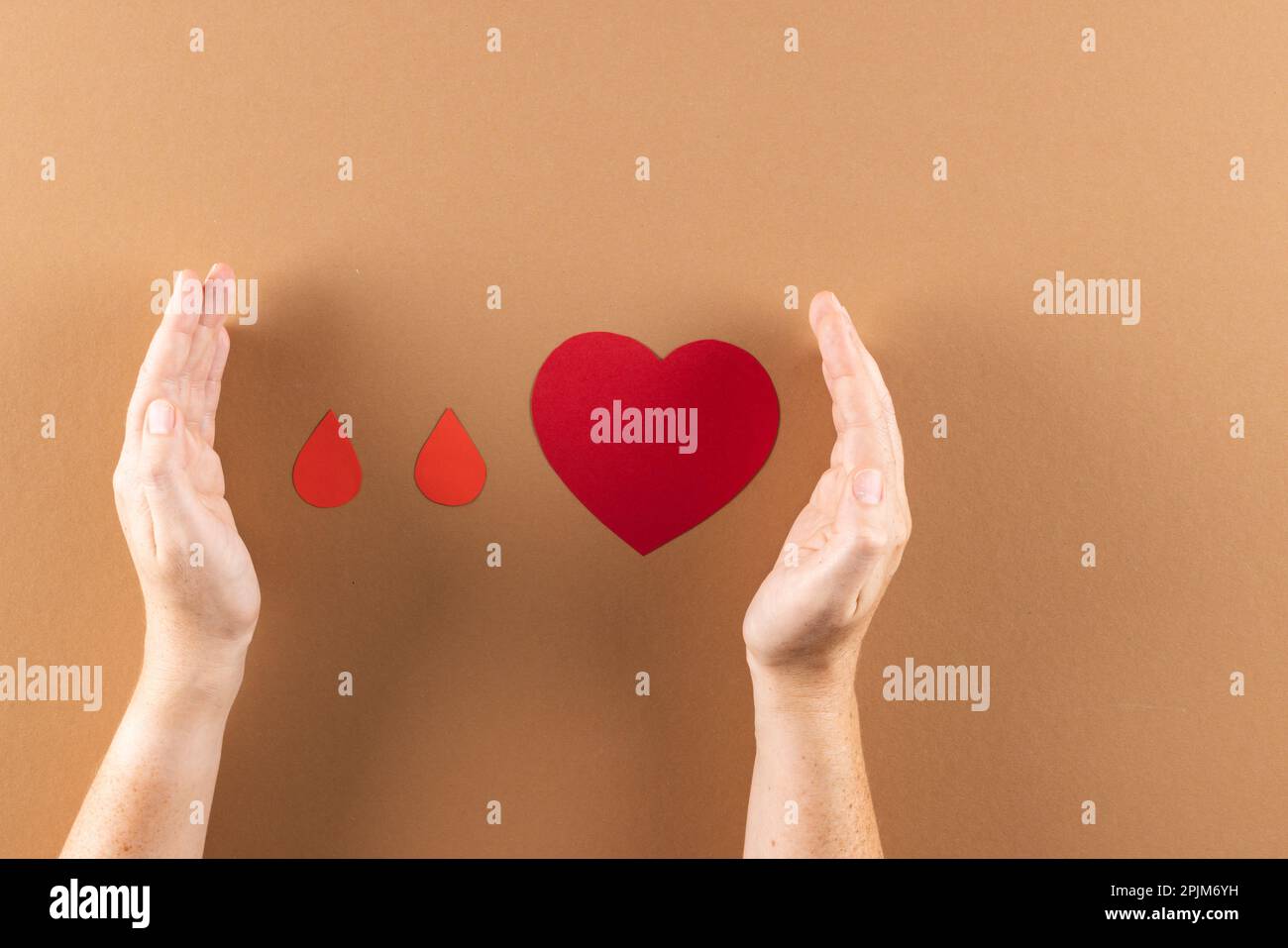 Protecting hands hi-res stock photography and images - Alamy