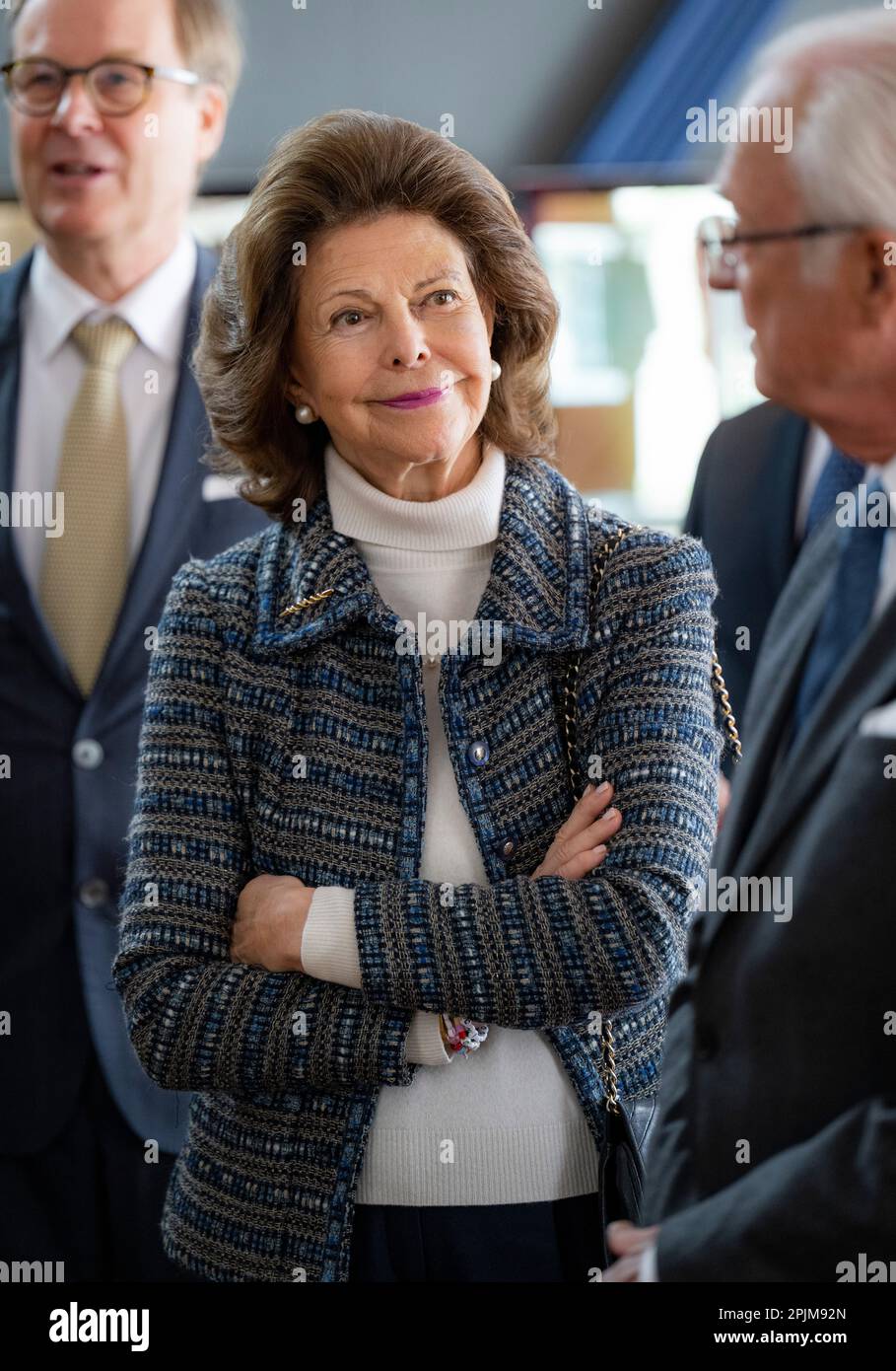 Sweden's Queen Silvia King smiles at Carl XVI Gustaf during the visit ...
