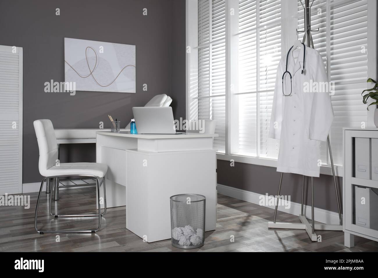 Modern medical office interior with doctor's workplace Stock Photo - Alamy