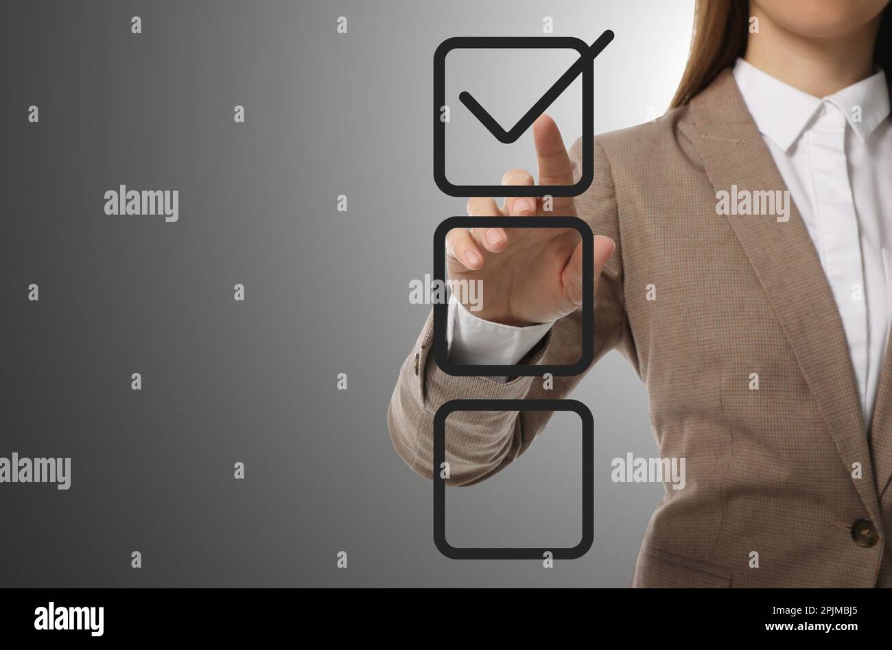 Woman pointing at check mark in box on virtual screen, closeup. Space ...