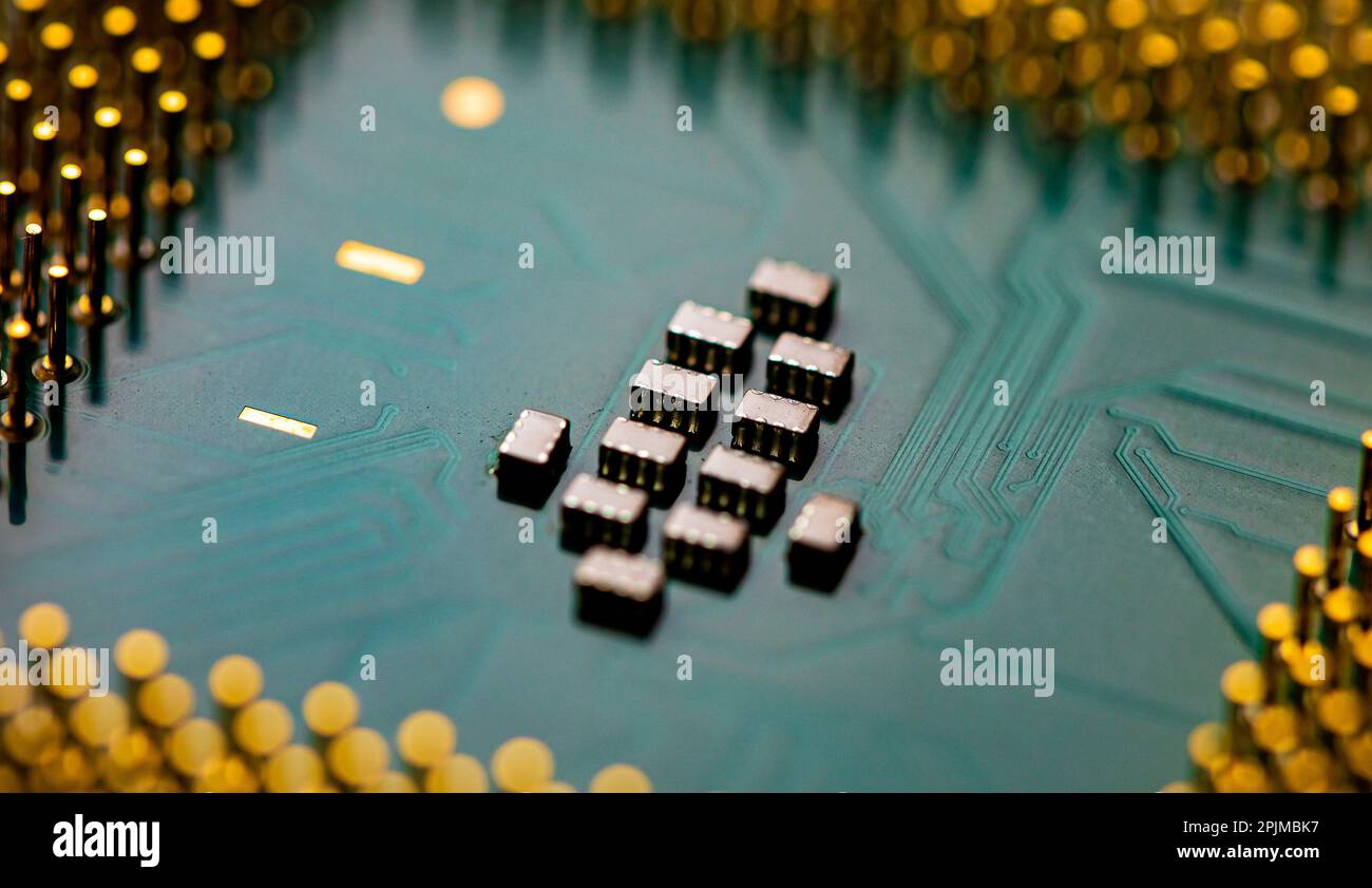 Macro Close up of microchips and pins on Main CPU PC processor circuit board Stock Photo - Alamy